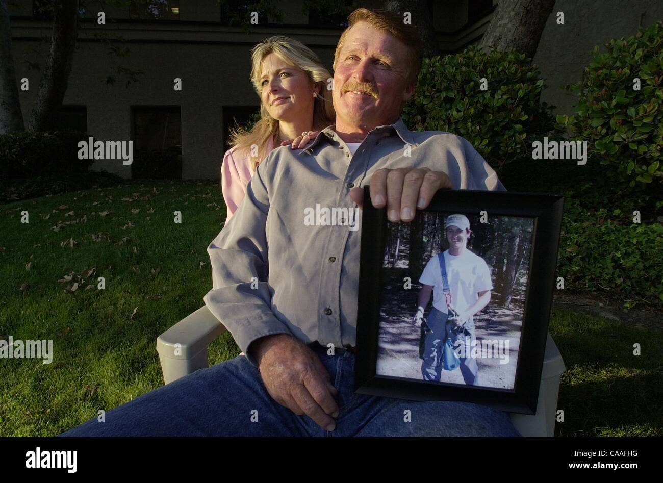 (Published 8/15/2004, B-1:1,2,3; UTS1825739 ) Rex Johnston (center ...