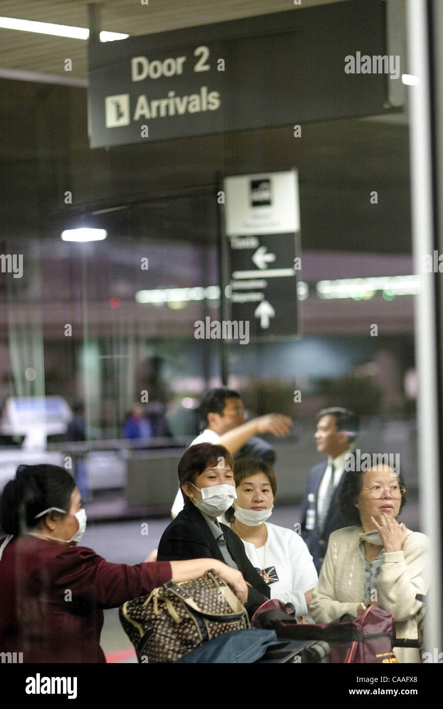 Apr 24, 2003; San Francisco, CA, USA; Passengers on a Plane flight from ...