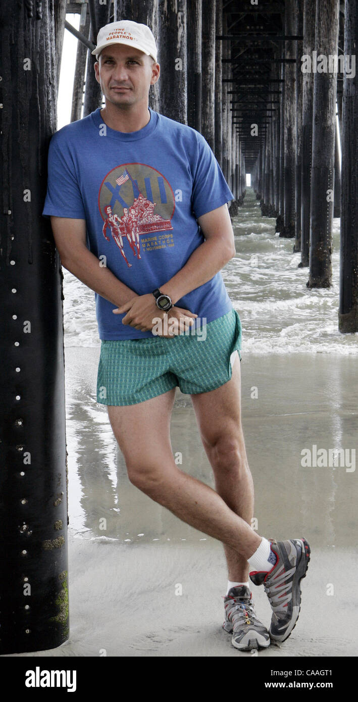 Runnner Joe Cross stands under the Oceanside Pier on Thursday. Cross ...