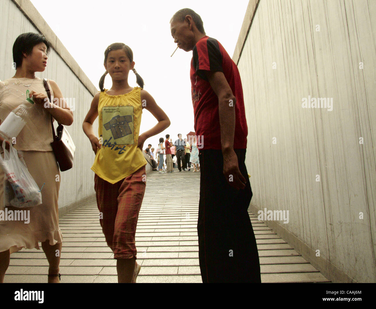Beijing China youth walking down ramp to underground at Tiananmen ...