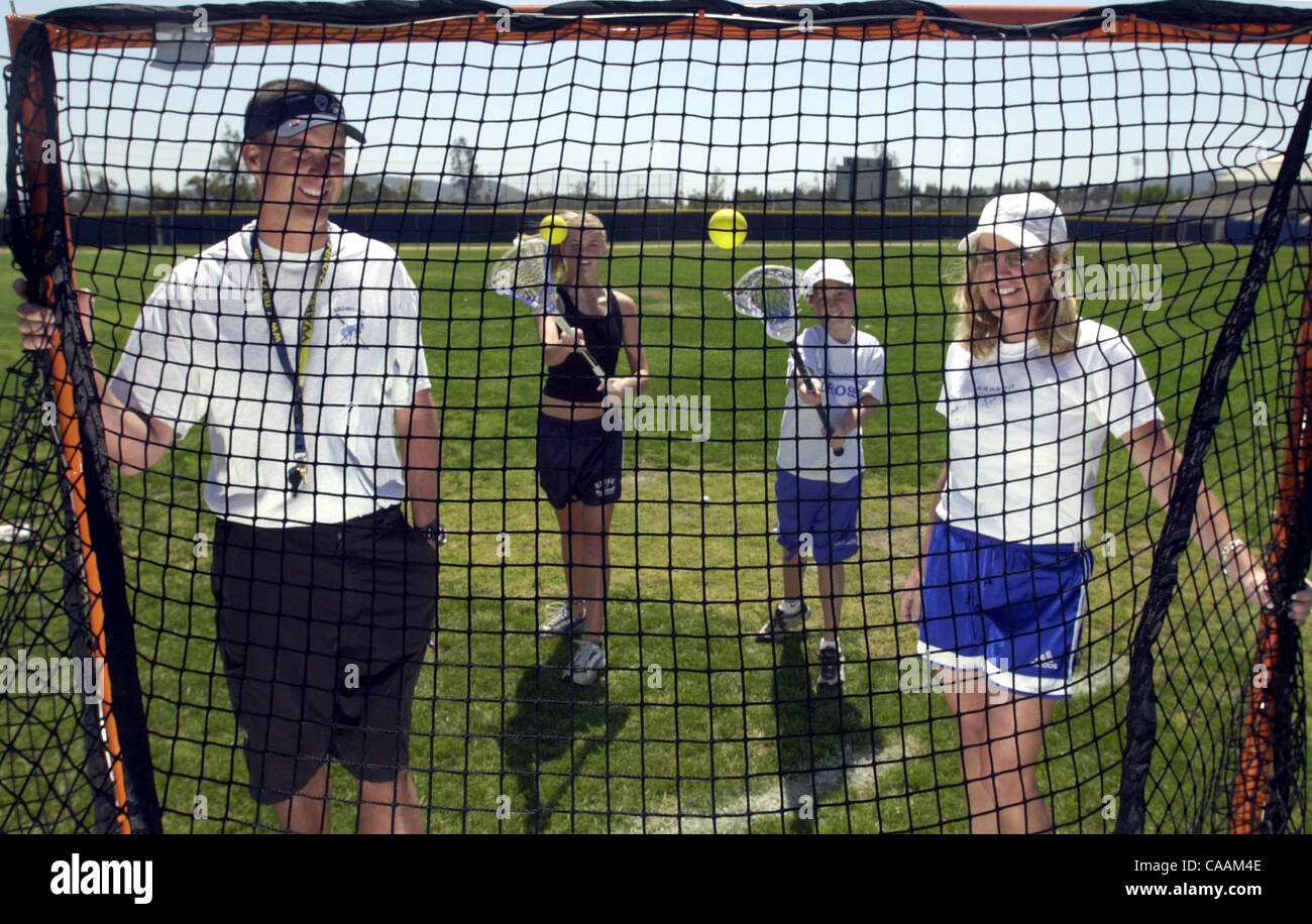 (Published 04/27/2003, N-8) SLlacrosse203731x001/Apr 18---At left ...