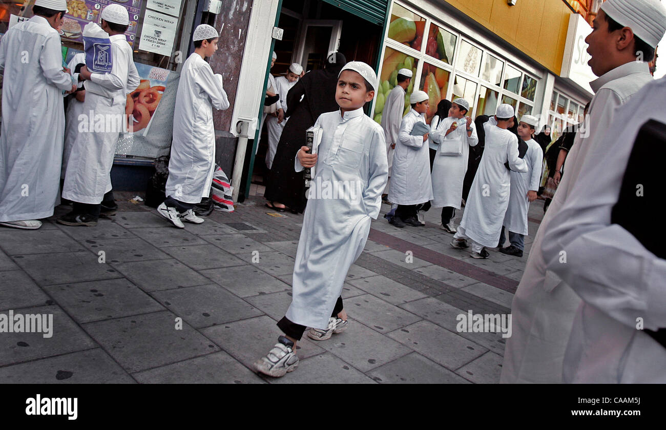 Oct 18, 2003; London, UK; A young Muslim boy carrying the Koran leaves ...