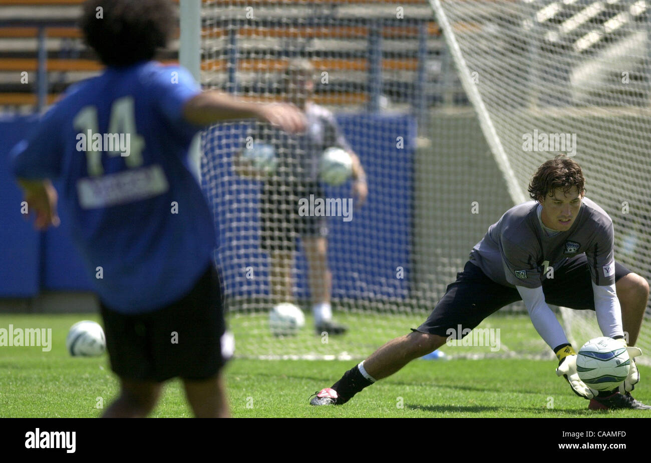 an Jose Earthquakes goalie Jon Conway, right, makes a stop during ...