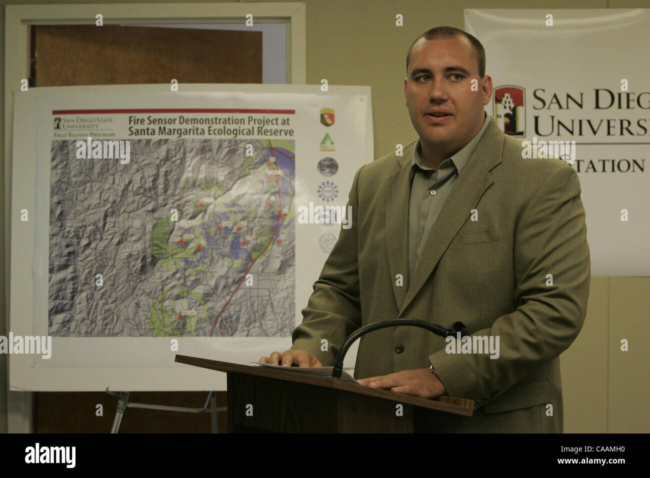 (Published 7/15/2006, A-1) Big guy in suit at podium is MATT RAHN, Ph.D ...