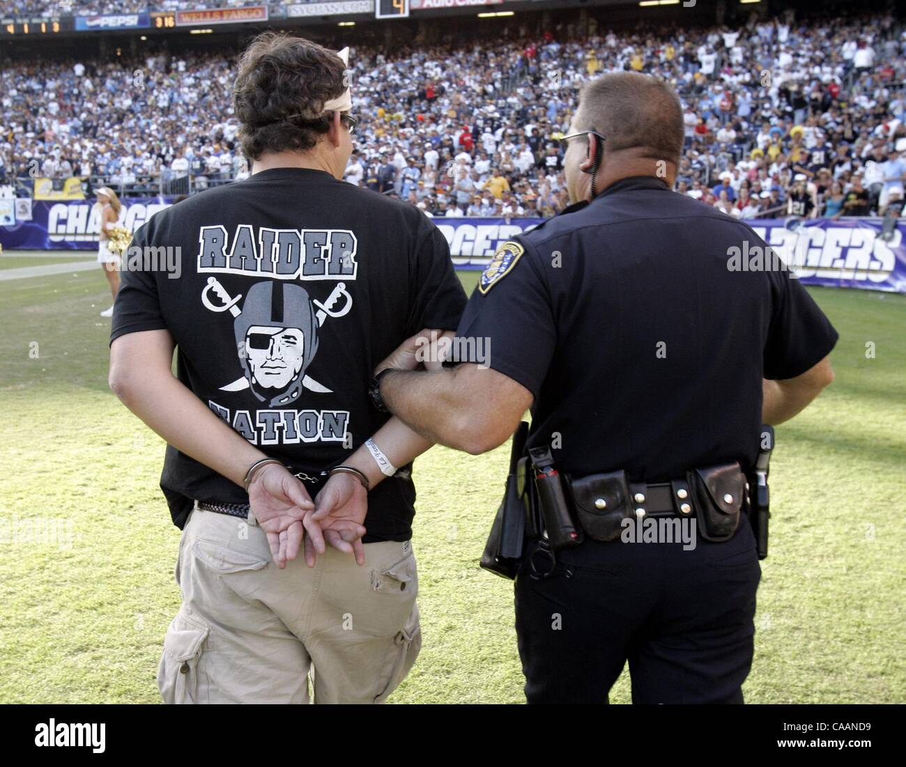 Escorted in handcuffs hi-res stock photography and images - Alamy
