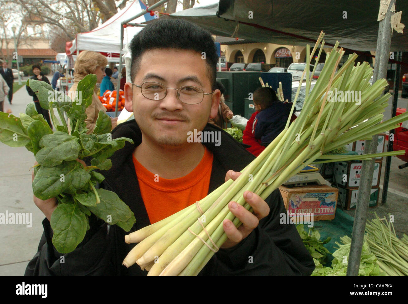 Dona Xiong, of Ger Xiong's Farm in Fresno, poses with spinach and ...