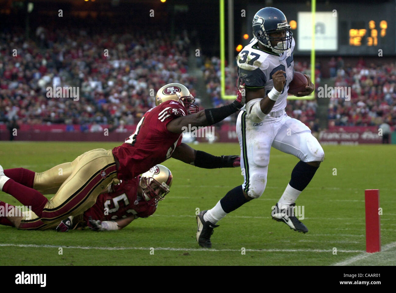 Saleem Rasheed (diving) and Jeff Ulbrich (bottom) can't prevent ...