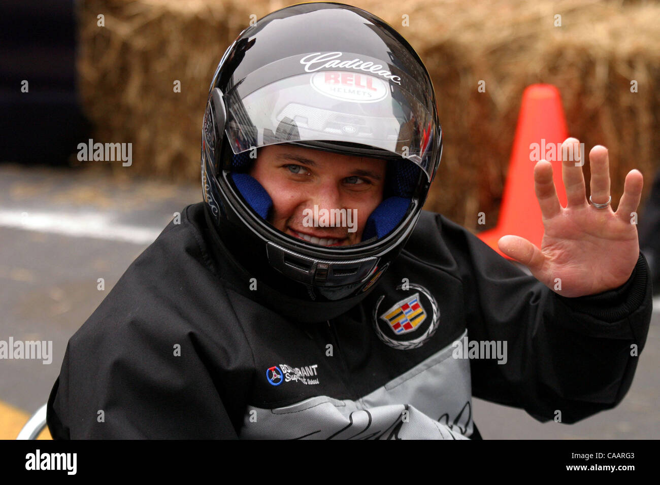 Jan 31, 2004; Houston, Texas, USA; NICK LACHEY waves at a go kart race ...