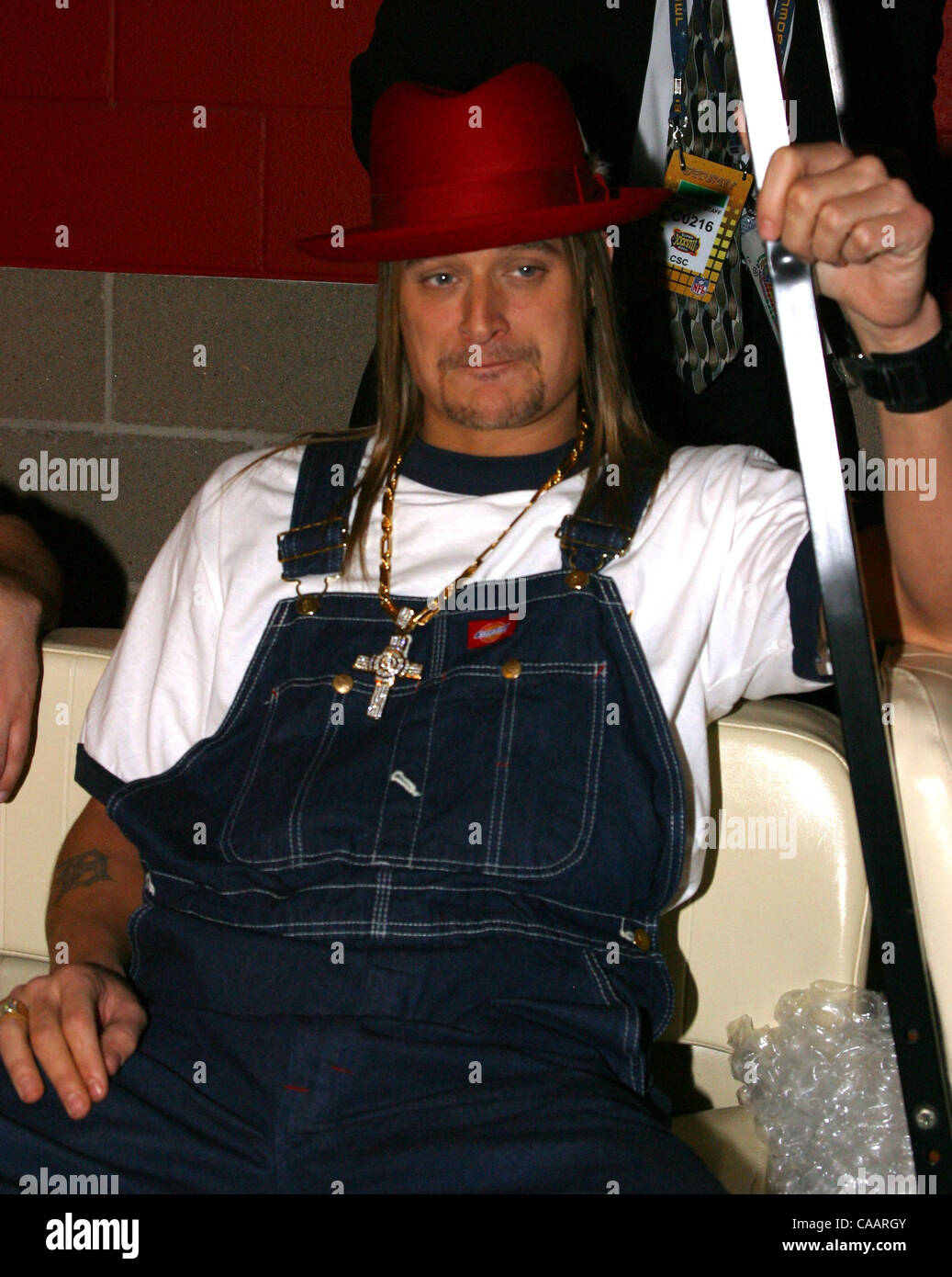 Feb 01, 2004; Houston, TX, USA; KID ROCK rides on a cart backstage ...