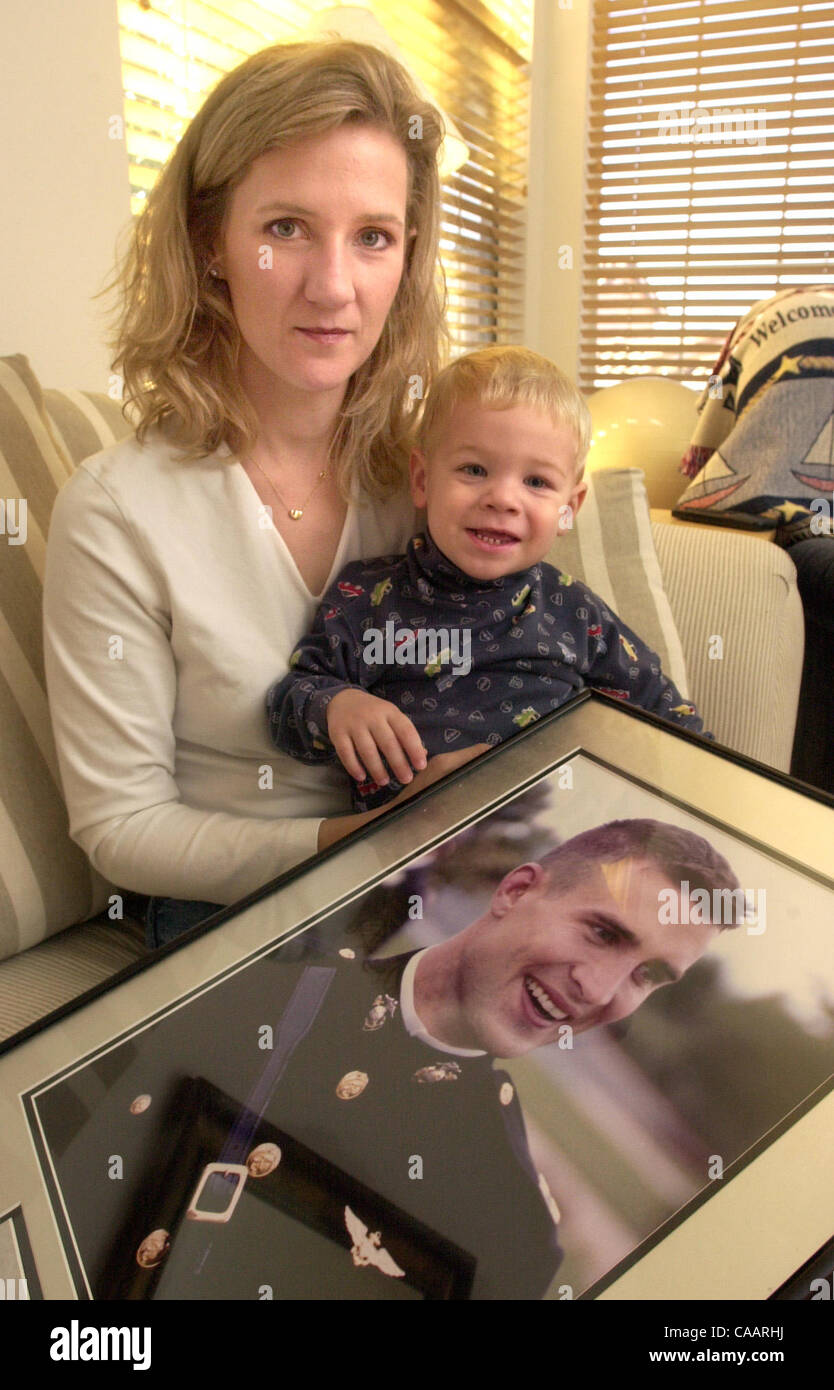 Portrait of JENNIFER McCOLLUM with her son DANIEL JR. as they hold hold ...