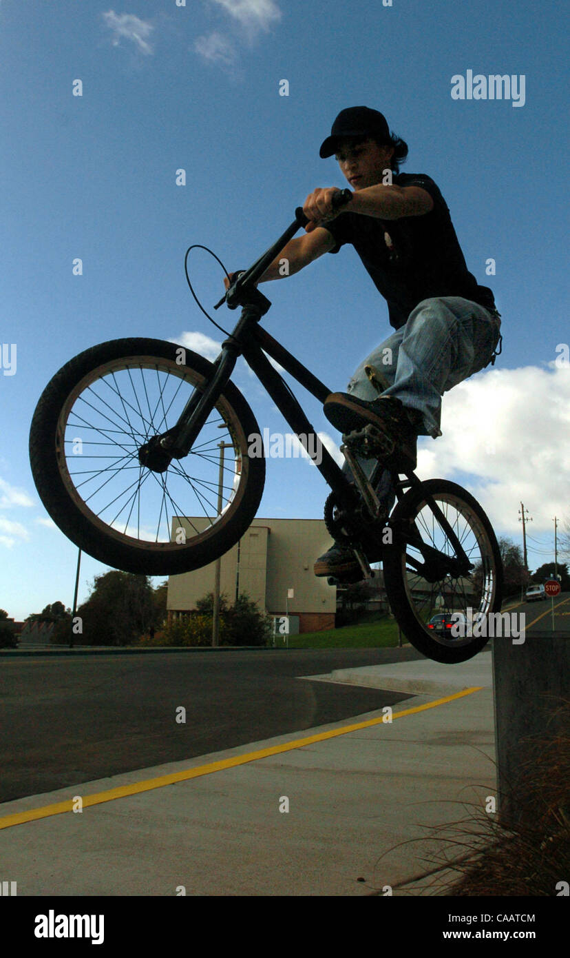 1428--Chris San Agustin launches into the air as he jumps off a ledge ...