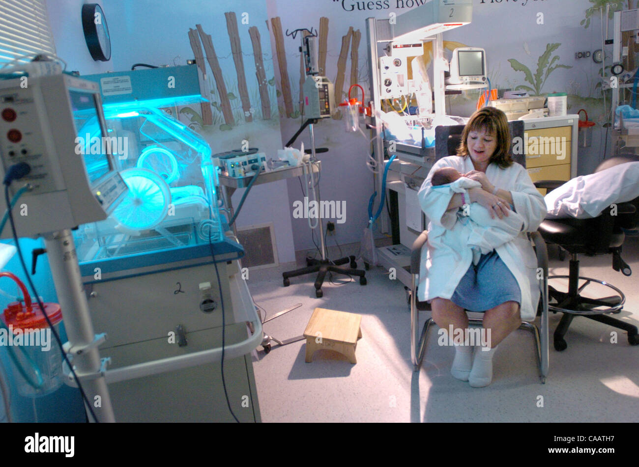 24 HOURS SAN RAMON (12:04:47 AM) Jamie LaPierre (cq) holds her new son ...