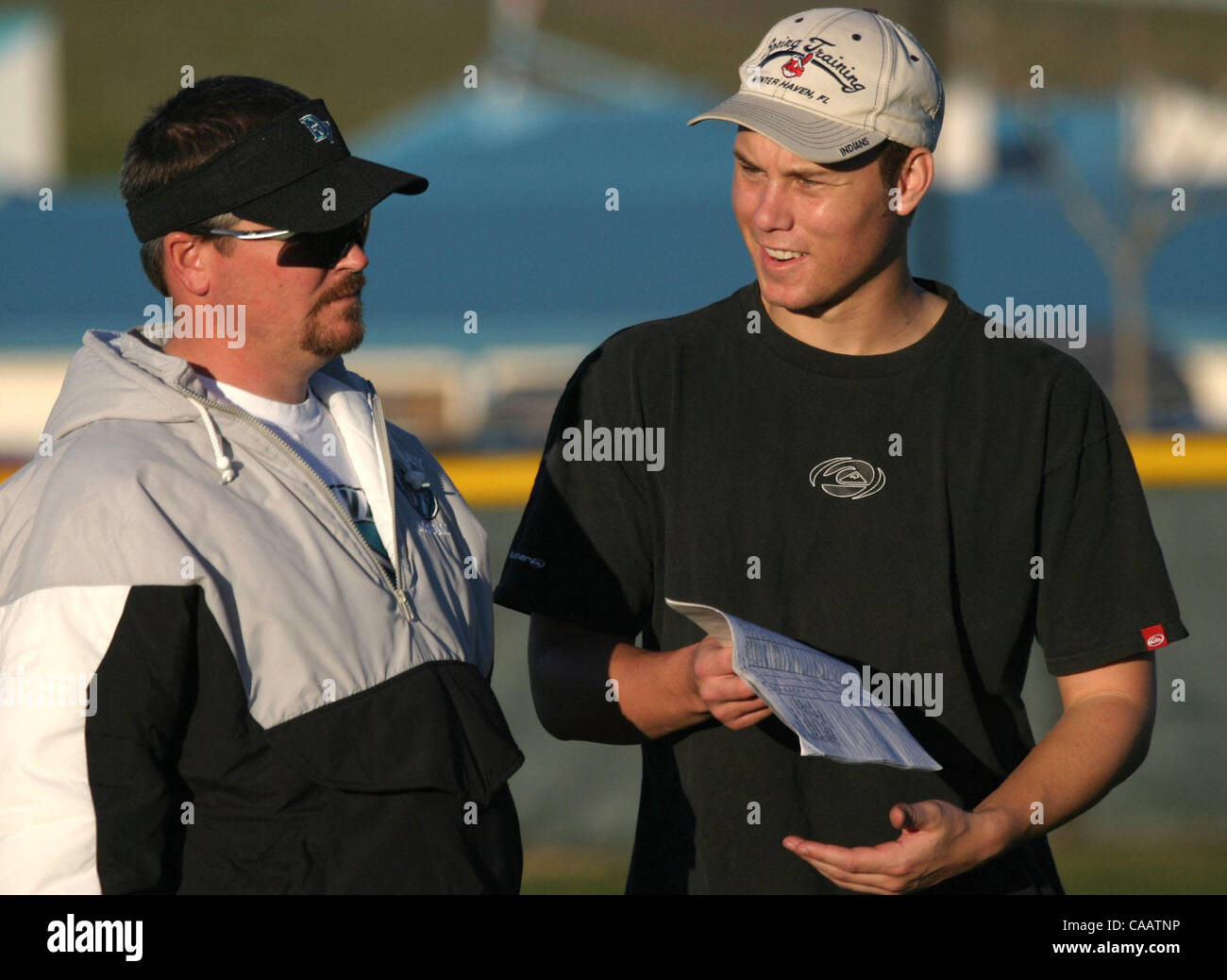 Pitcher Daniel Denham cq (right) chats with Deer Valley assistant ...