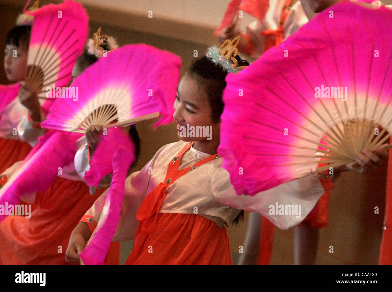 Linh Phung 12, of San Leandro, Calif., and other members of the ...