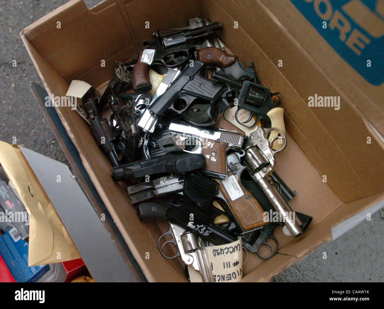 These boxes of weapons that were confiscated by school district police ...