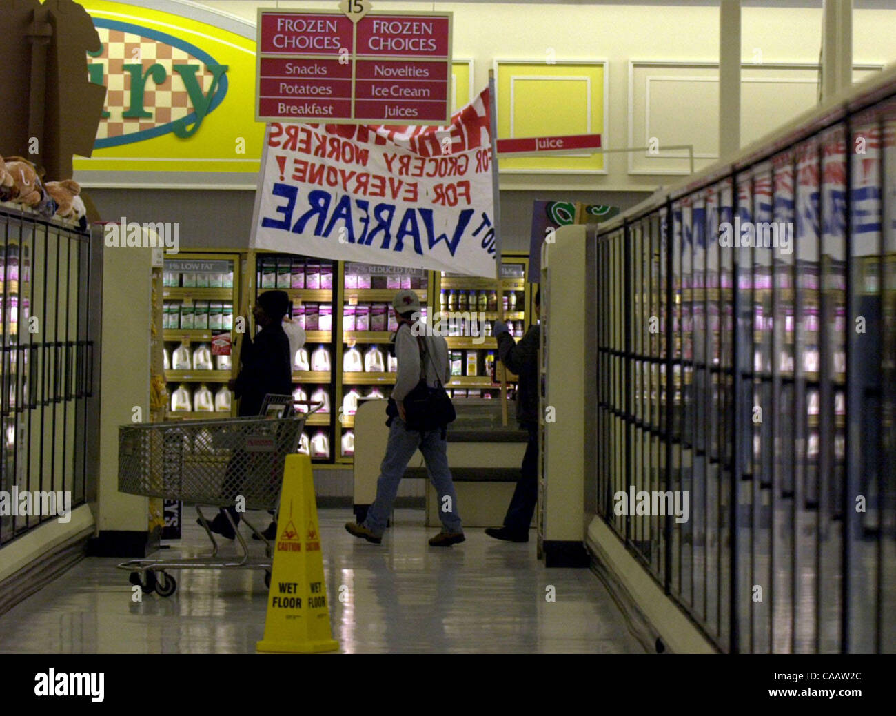 None union members march through frozen foods as they protest in ...
