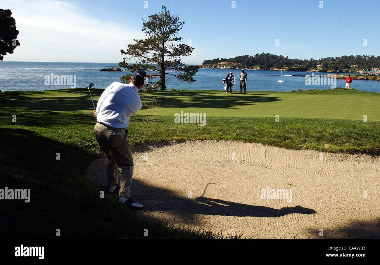 Arron Oberholser hits out of a sand trap on the 5th hole of Pebble ...