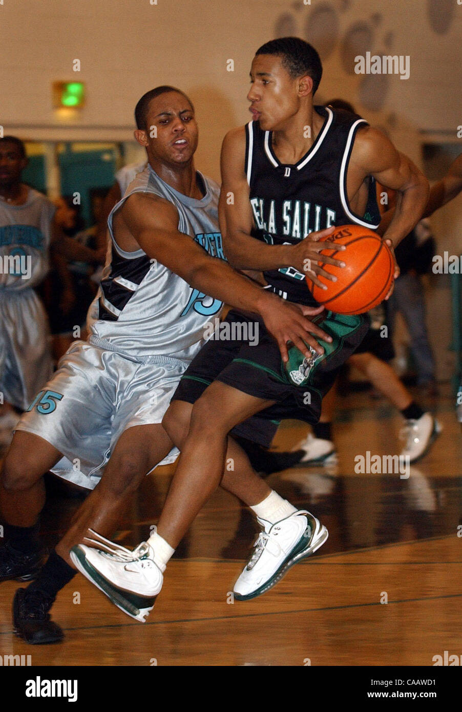 Deer Valley's Charles Prescott gets in front of De La Salles' Justin ...