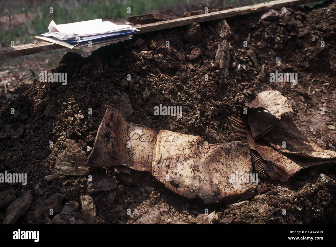 A reopened grave in a graveyard used for body storage The scrap of ...