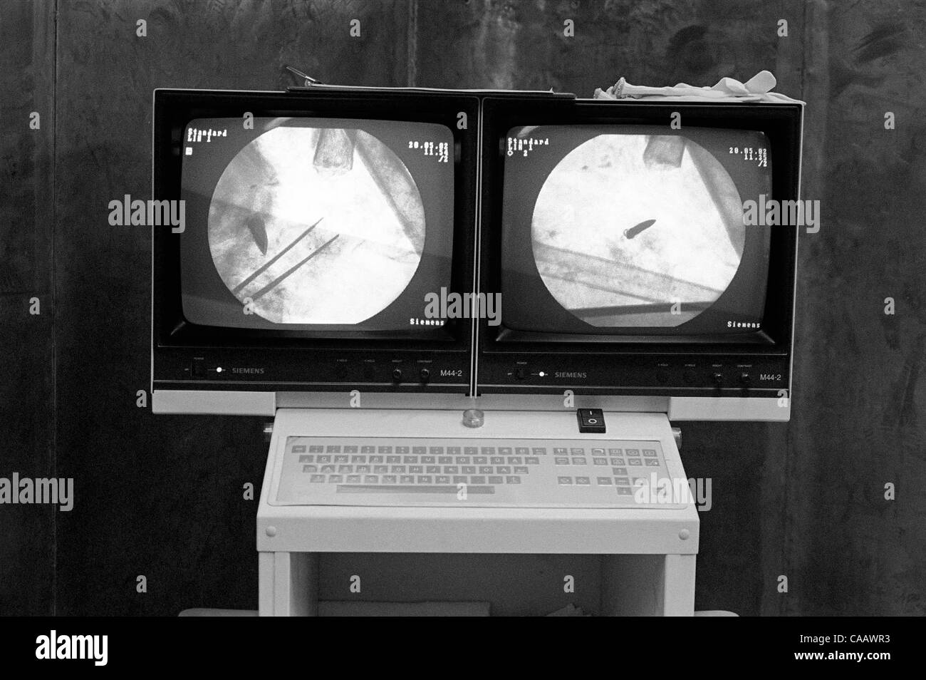 Forensic check Black and White Stock Photos & Images - Alamy