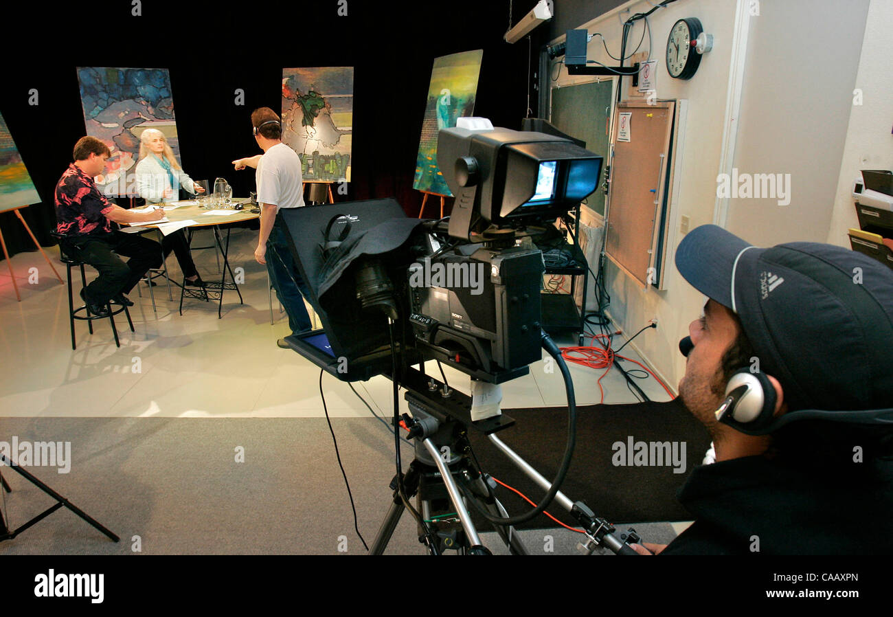 Camera operator CARLOS MIRANDA aims the camera at the show's set as ...