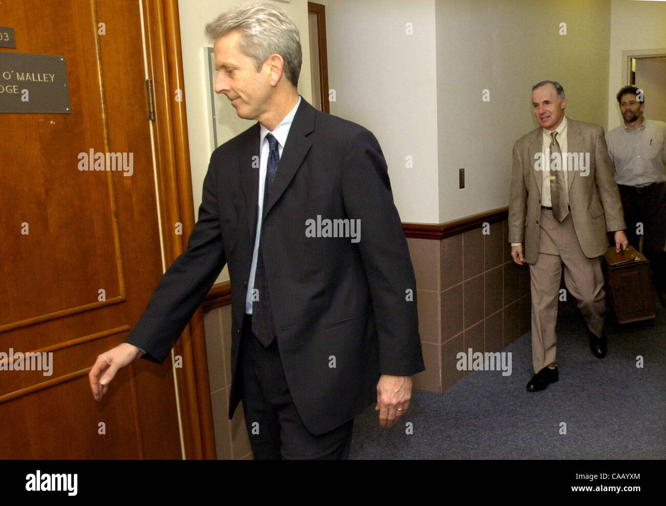 Attorneys for Justin Helzer, Dan Cook, left, and Charlie Hoehn, right ...