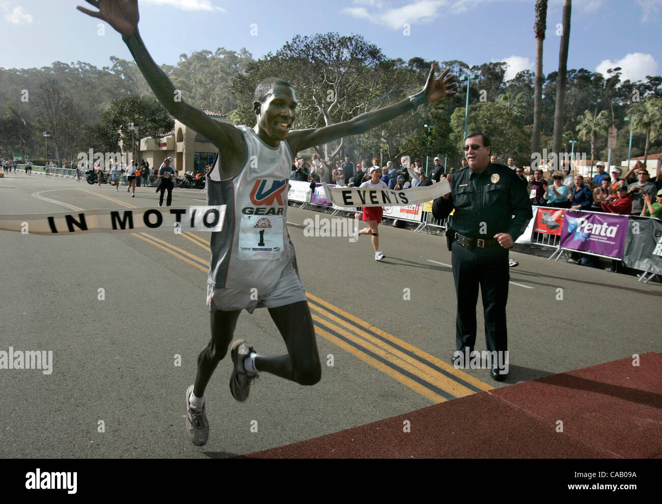 Marathon winner WILSON KOMEN crosses the finish line. U/T photo CHARLIE ...