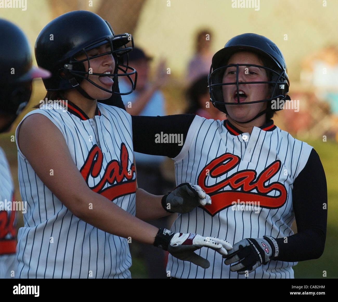 (RIGHT) California's Megan Grace, #10, congratulates (LEFT) Jen Clarke ...
