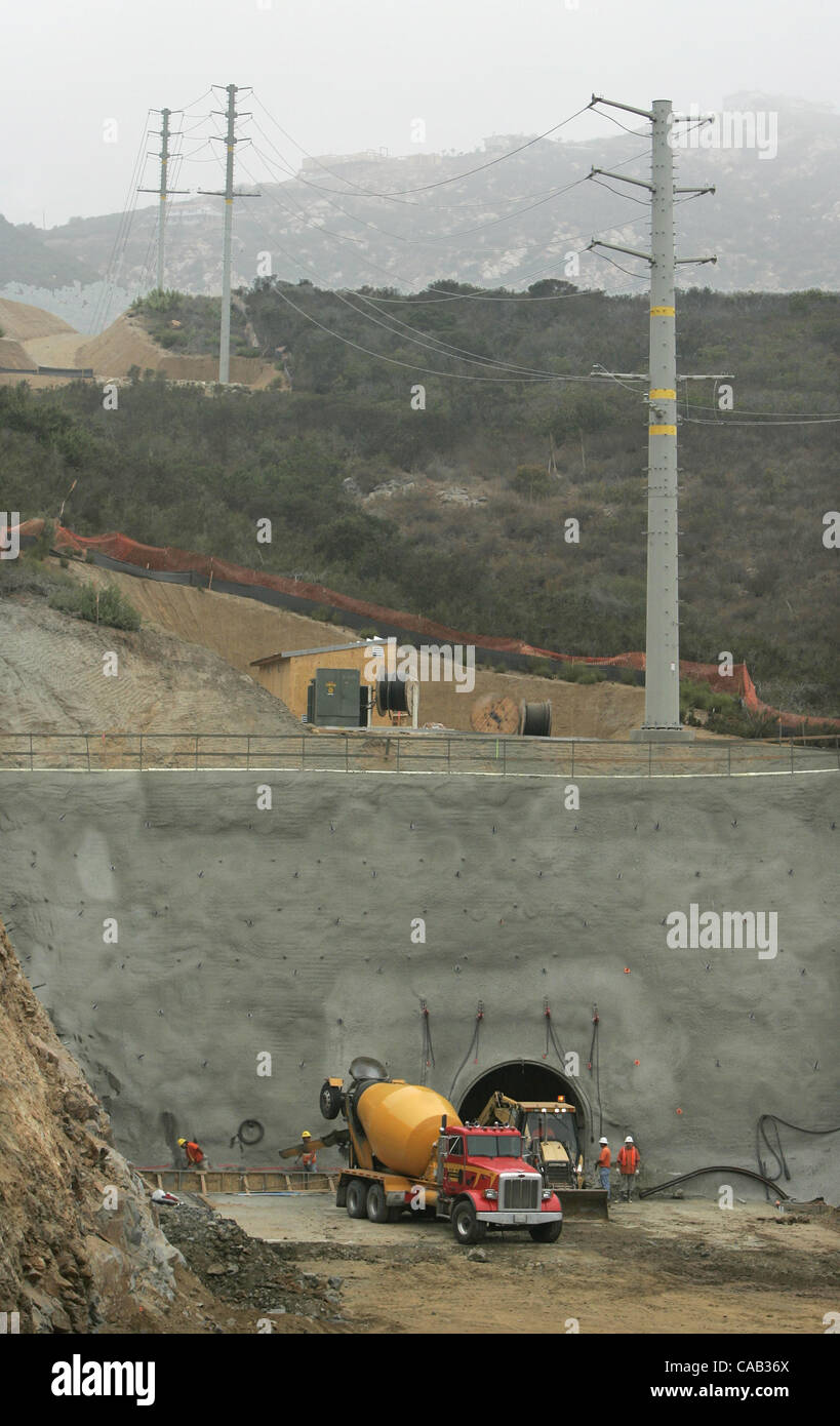 Electrical distribution towers guide high powered electrical wires to ...