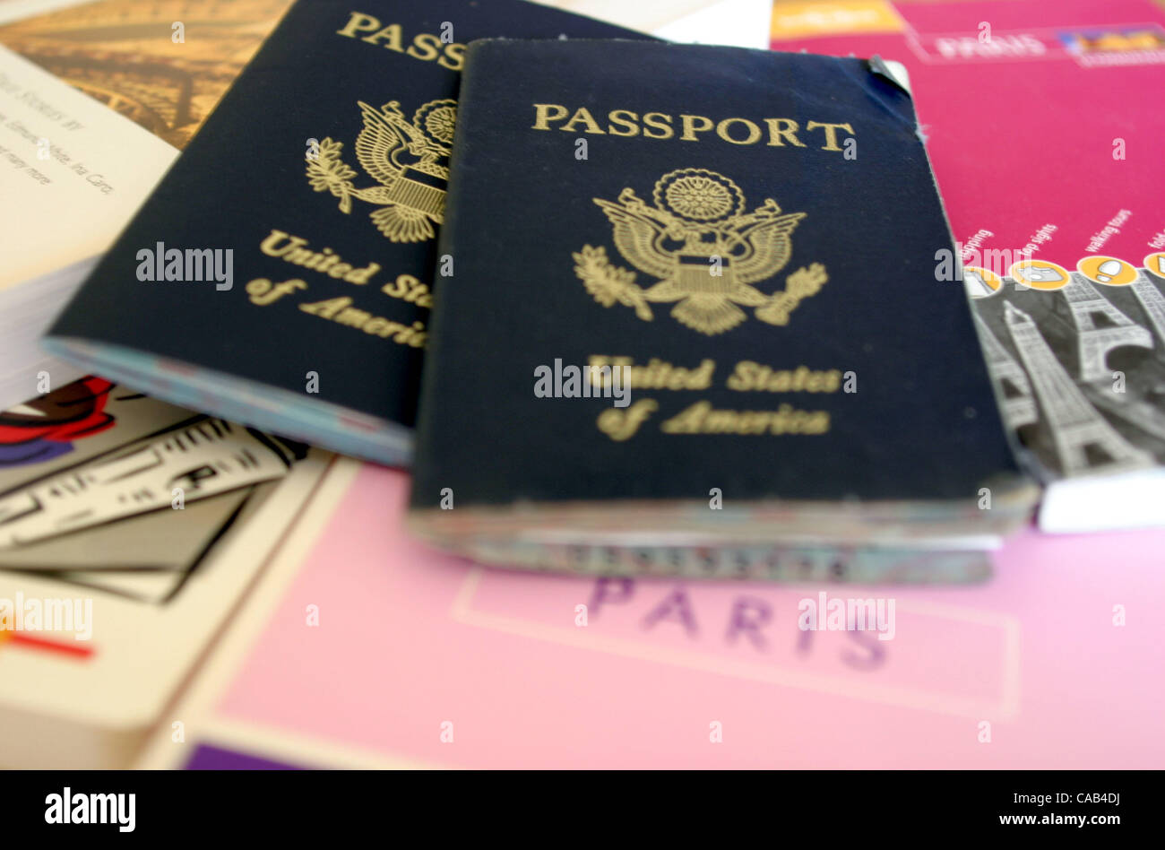 Jun 13, 2004; Los Angeles, CA, USA; American passport with travel books ...