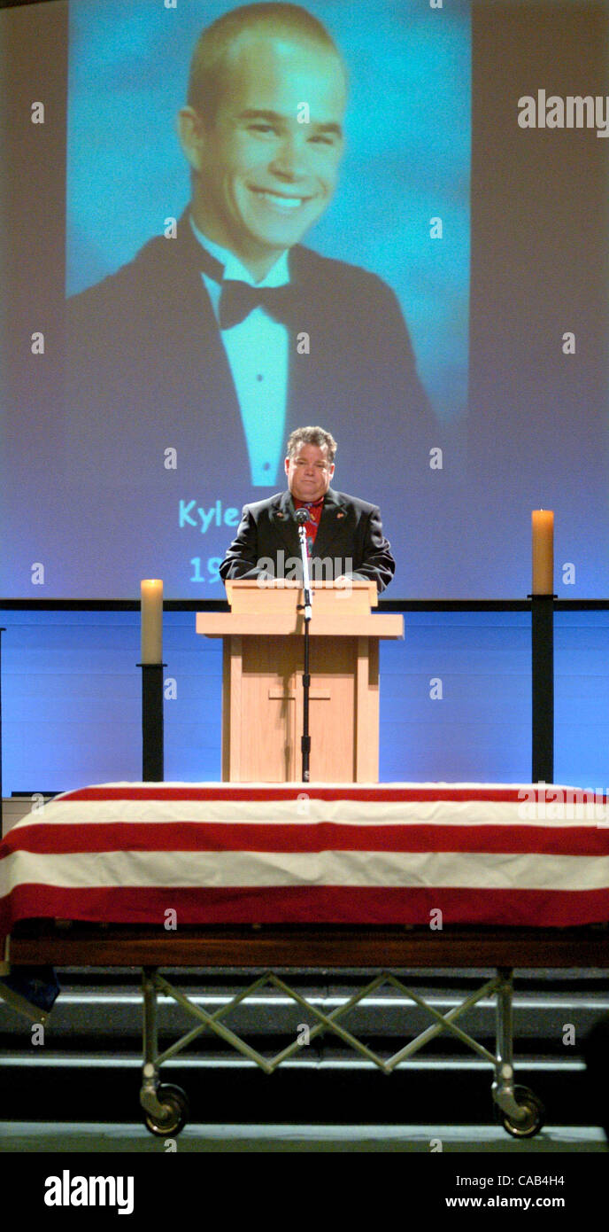 With an image of his son Kyle Crowley on the screen behind him, and a ...