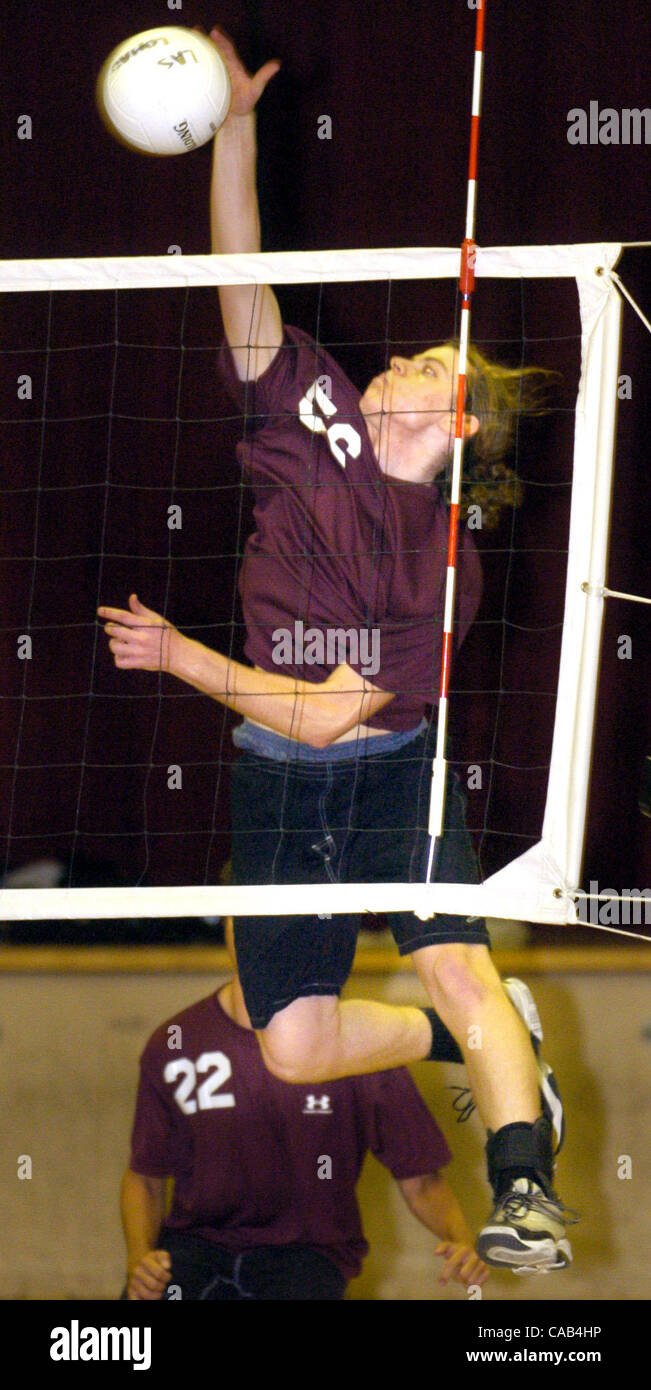 Zach Hamaker #56 of las Lomas flys thru the air and returns ball ...