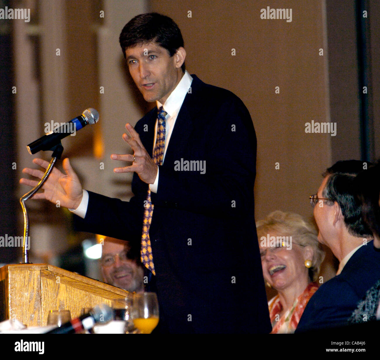 Guest speaker Kevin Ring speaking in front of large crowd at the 15th ...