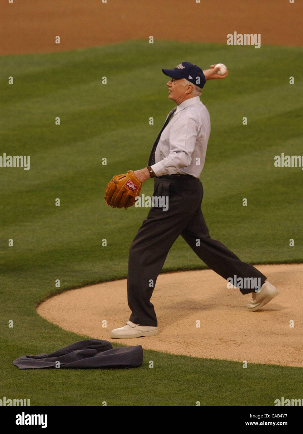 Former President Jimmy Carter throws out the first pitch during the ...
