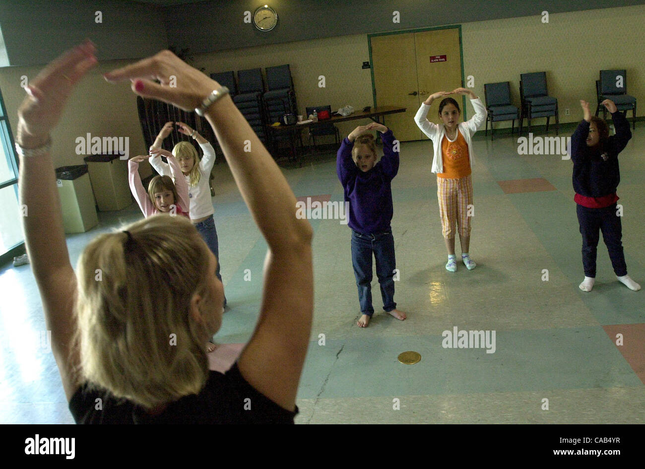 Choreographer Kelly Stack (back towards camera) rehearse for "Acorns to ...