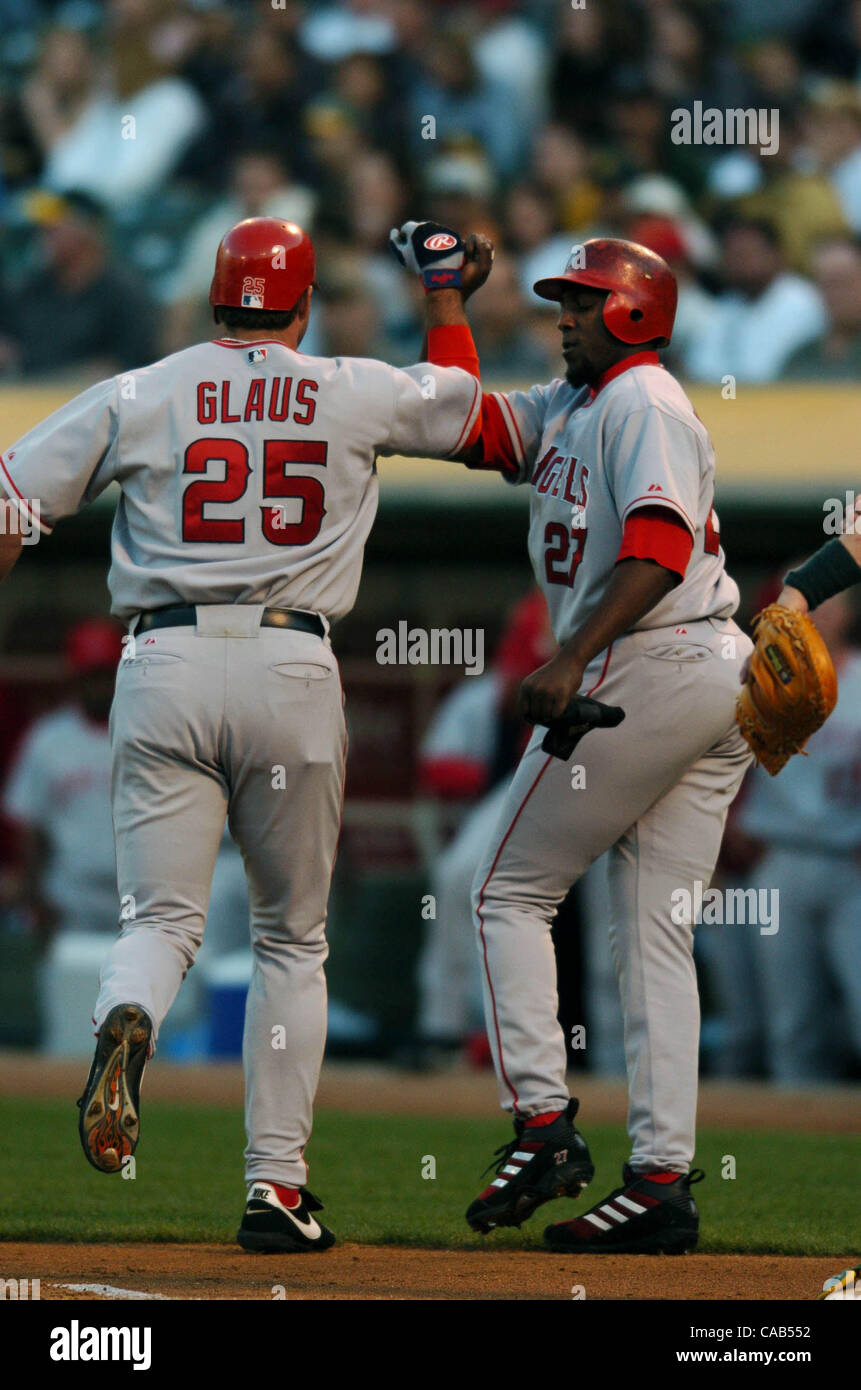 Vladimir Guerrero congratulates Troy Glaus after the Angel's 3rd ...