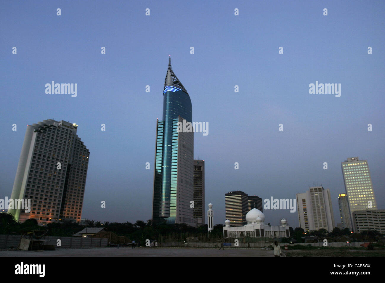 JAKARTA, INDONESIA - APRIL 28, 2004 Landscape of Jakarta with ...