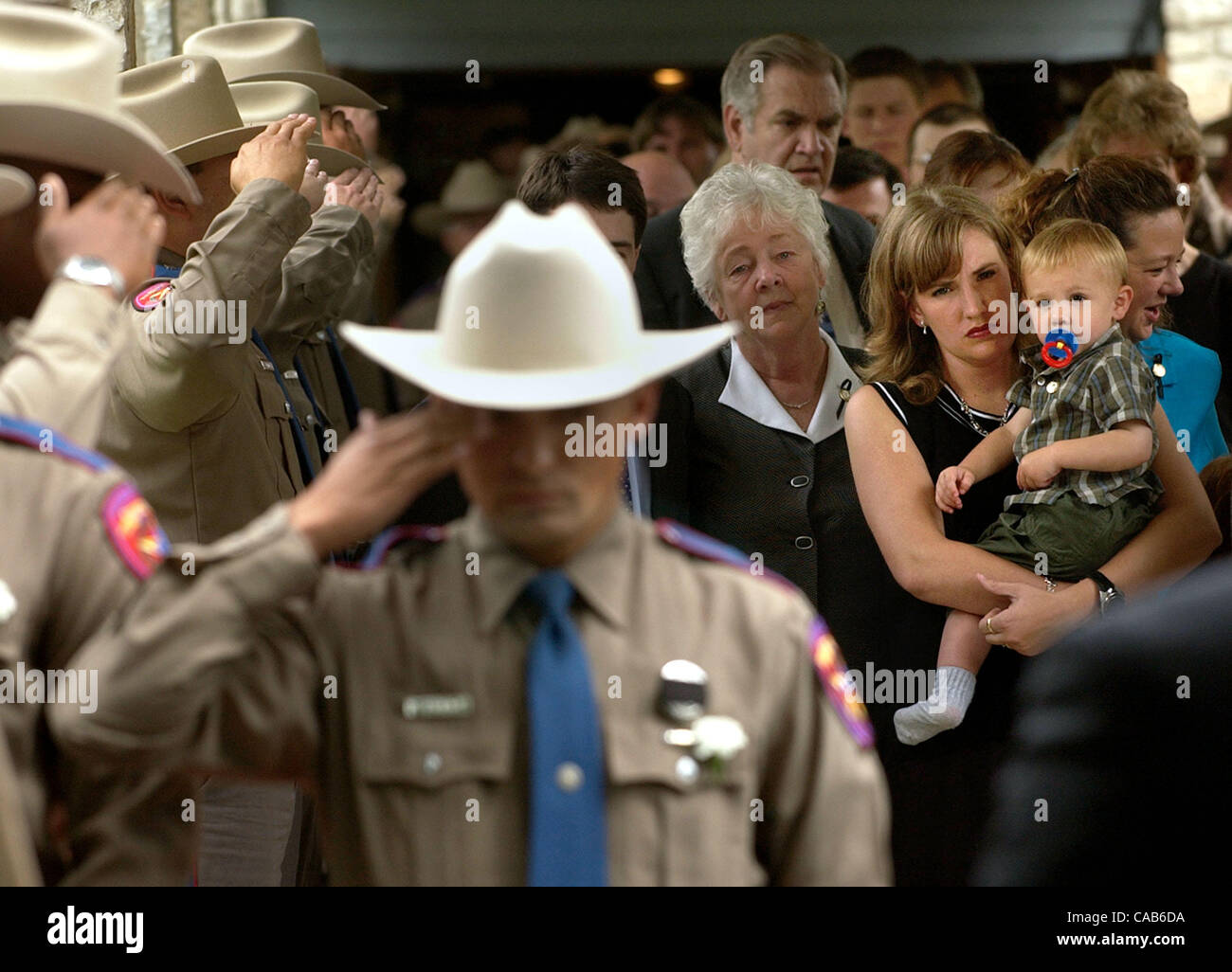 METRO --- DPS trooper Kurt David Knapp's family members, left to right ...