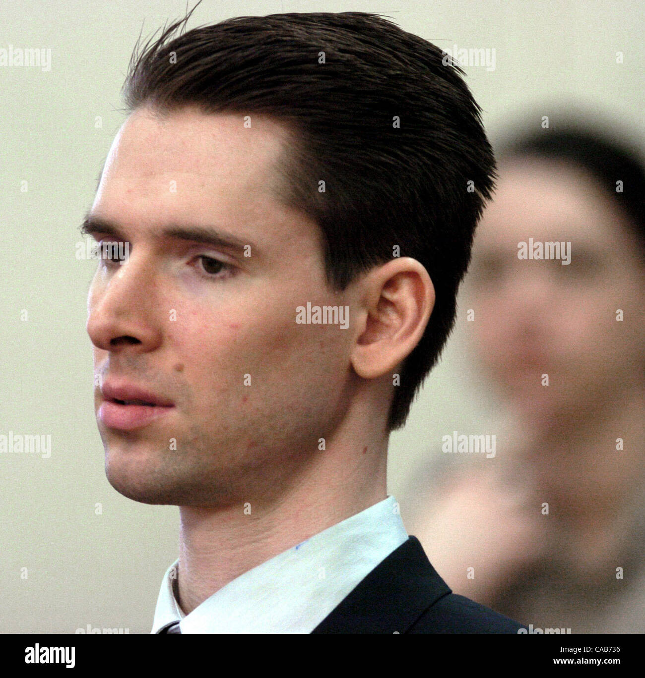 Justin Helzer sits in Dept 4 at the Bray Court Building Friday morning ...