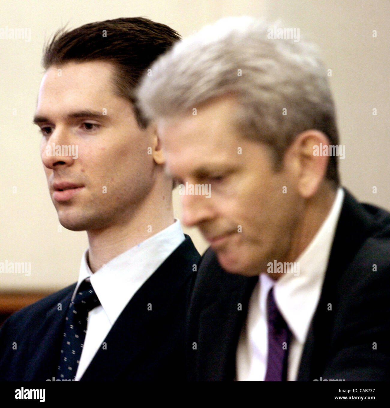 Justin Helzer sits in Dept 4 at the Bray Court Building Friday morning ...