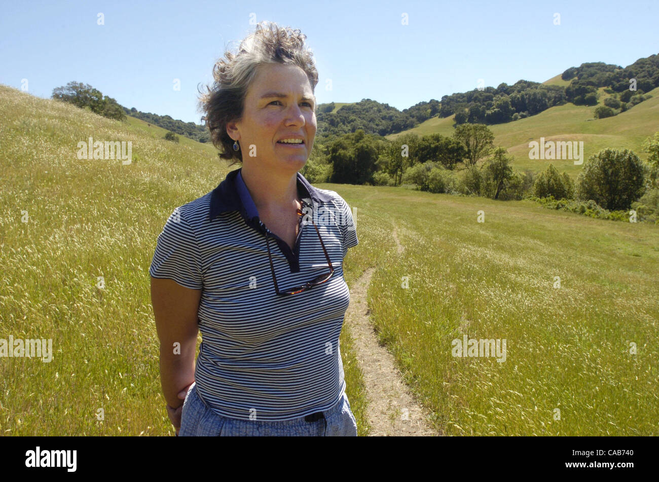 Tina Batt of the Muir Heritage land trust a non profit looks out at the ...