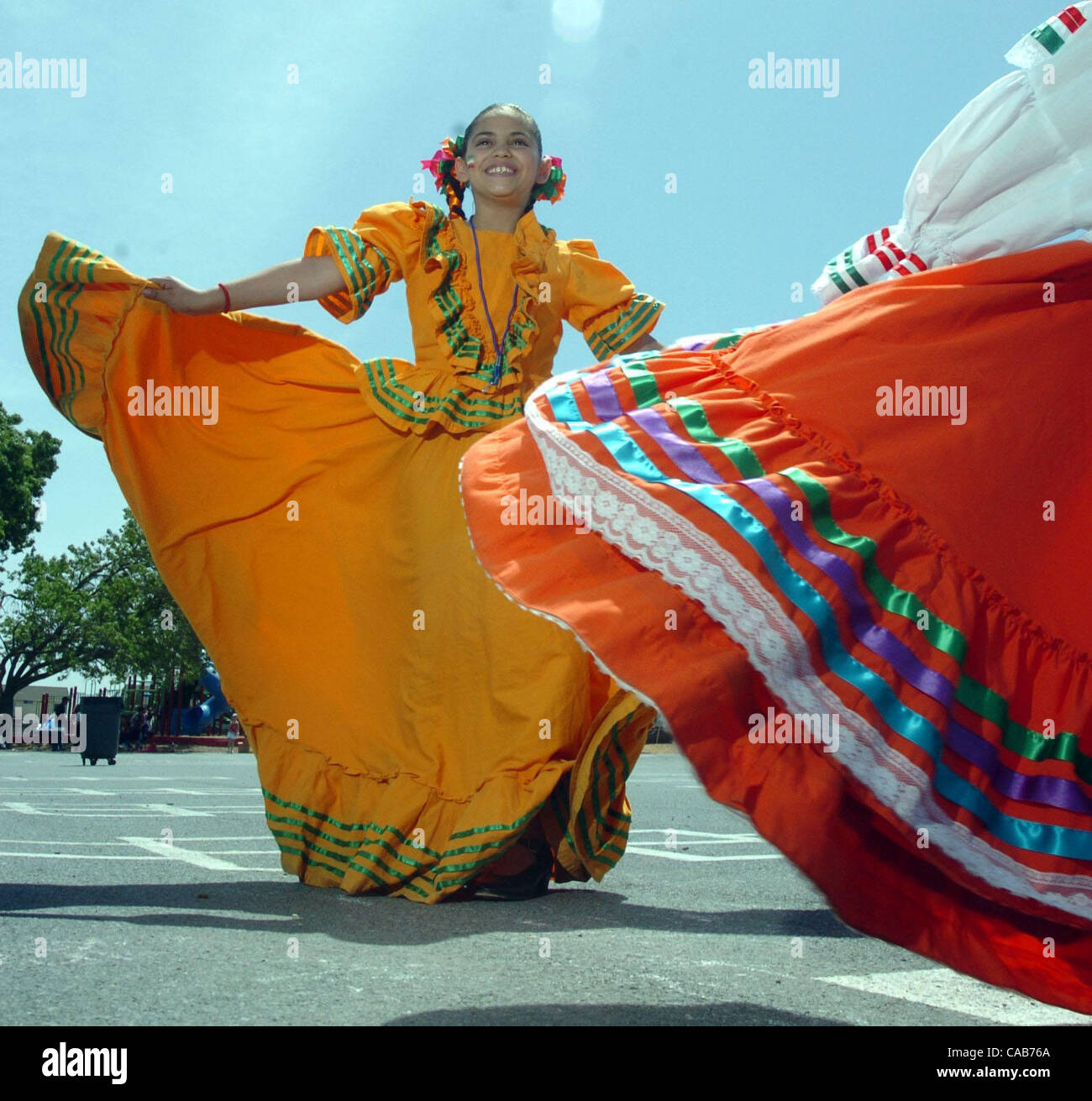 Lizette Suarez (cq) does a traditional Mexican dance with Folklorico ...