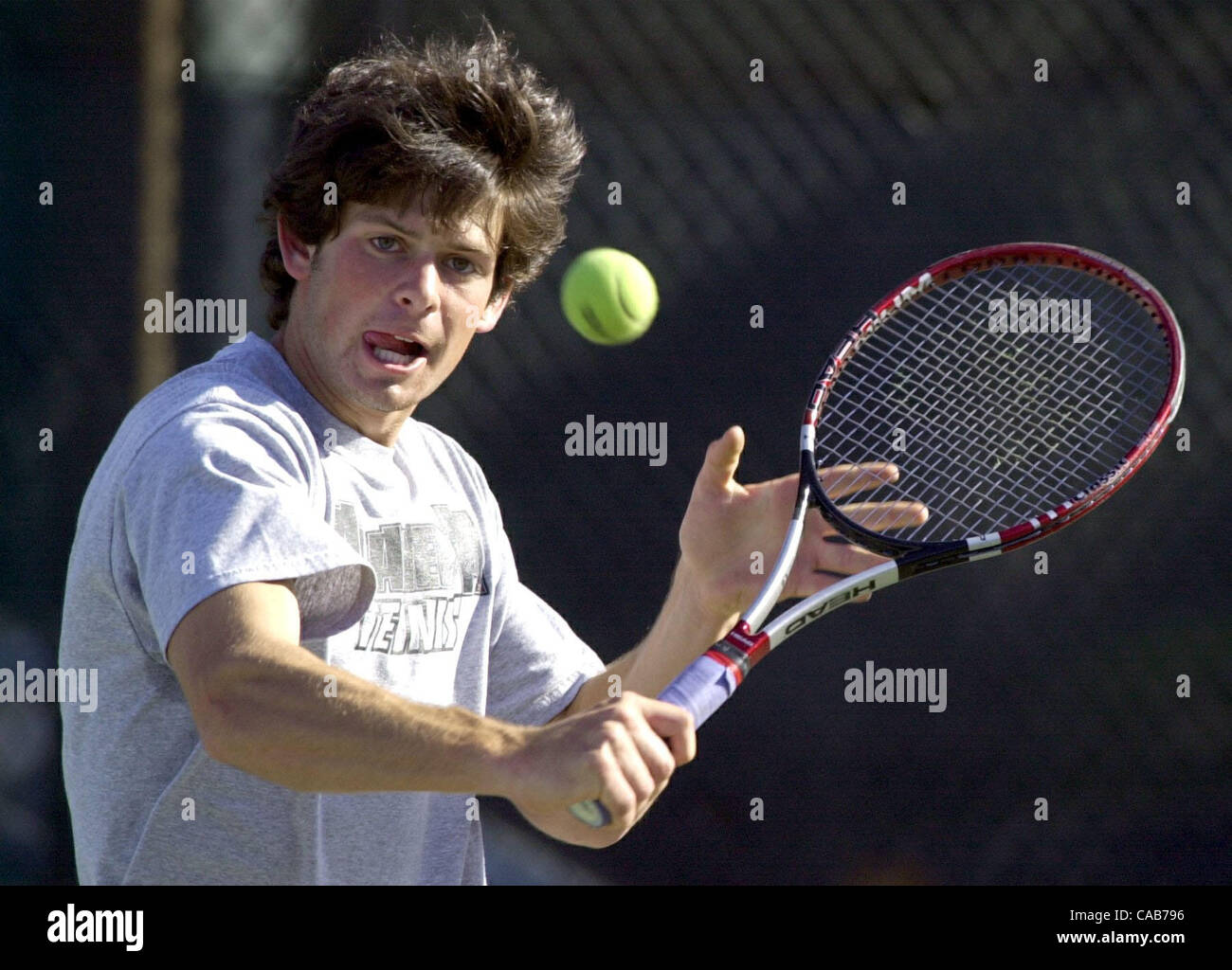 Alameda's #1 seed Daniel Elefant zeros in on a backhand return enroute ...