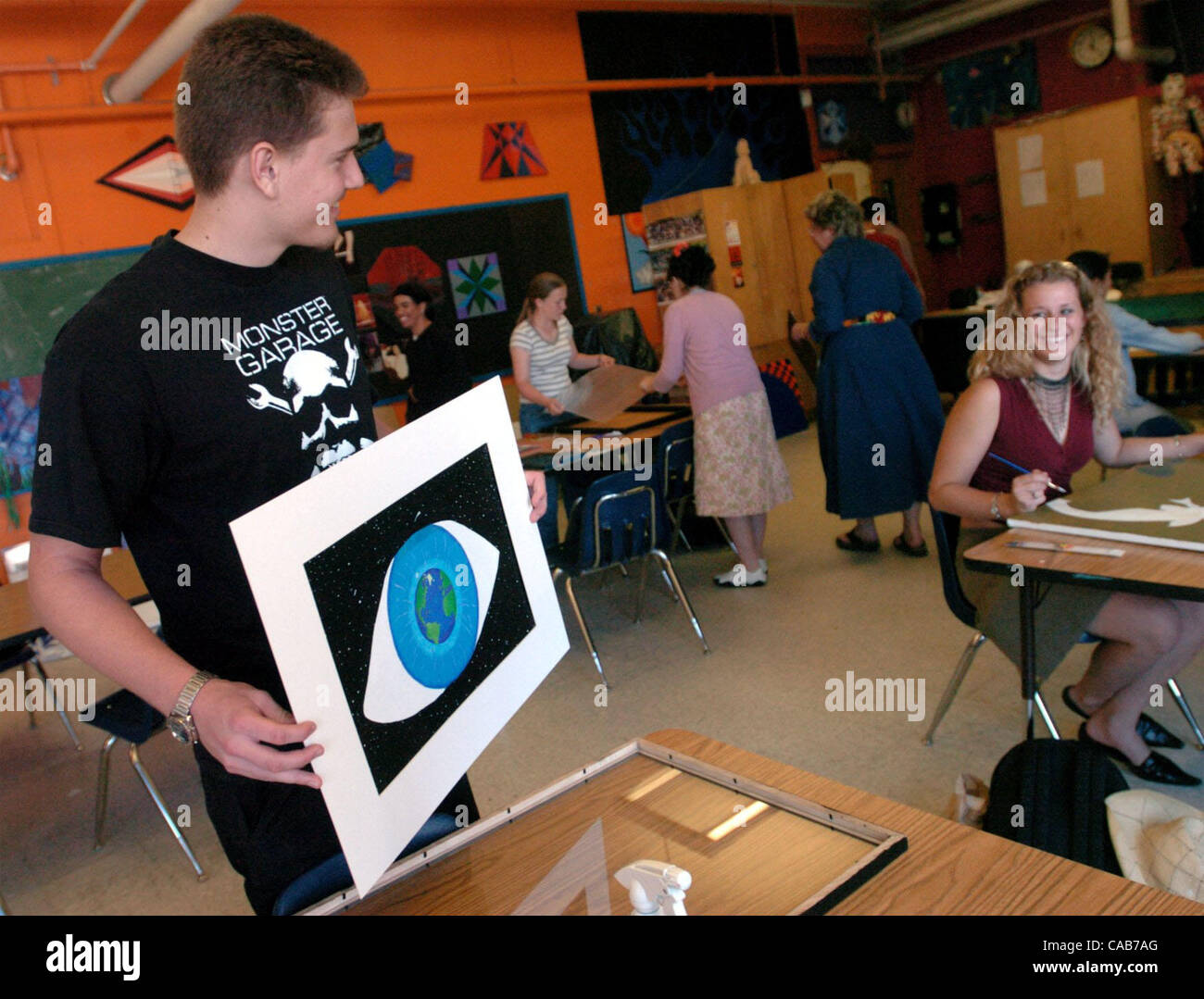( L TO R) Trevor Cross, 16, and Christina Thomson, 16, jokingly debate ...