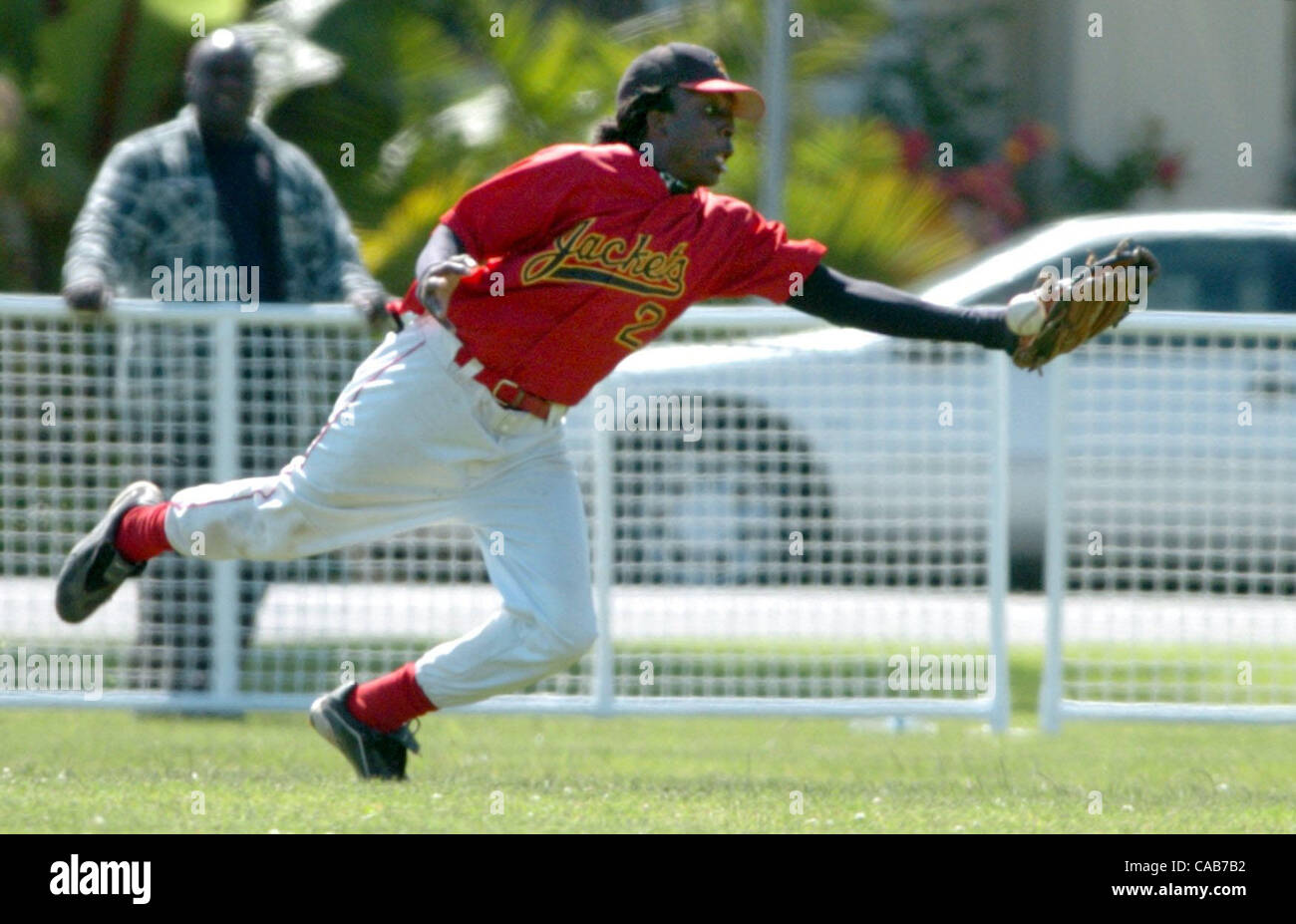 Terrell Ray of Berkeley High dives for a ball that gets away from him ...
