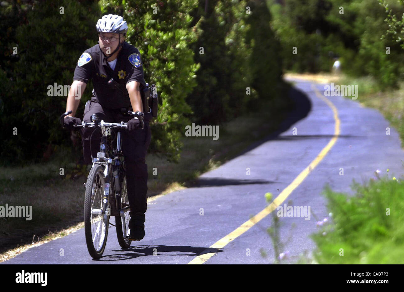 On a Mongoose mountain bike El Cerrito police officer Gilbert Tang (cq ...