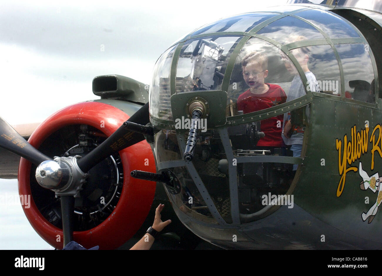 STATE-Thomas Erickson, left, and Trey Rompel examine the inside of the ...