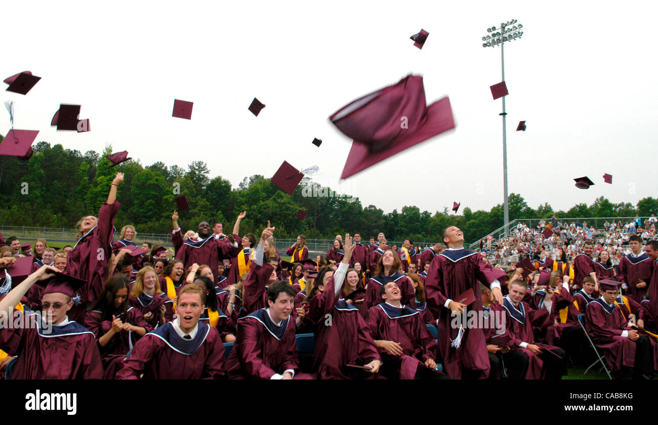 May 22, 2004; Woodstock, GA, USA; Woodstock HS graduates toss their ...