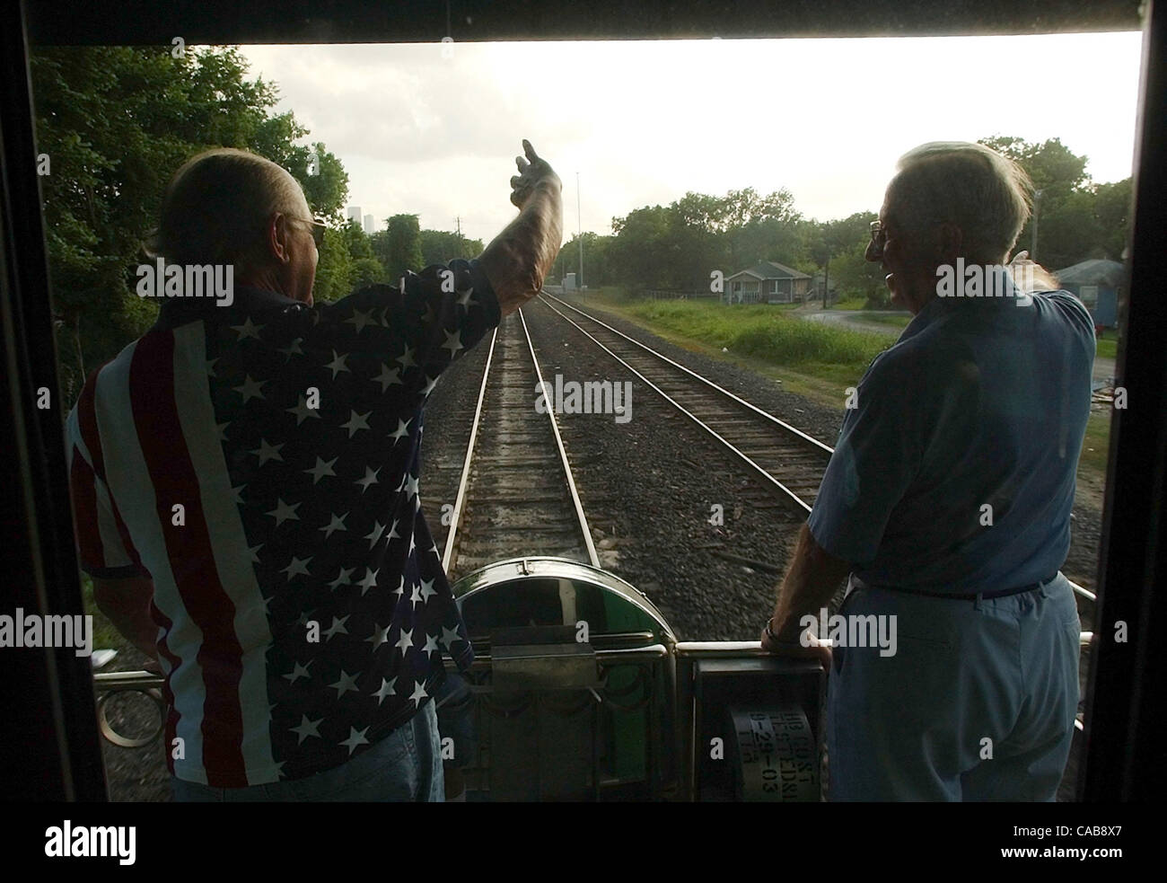 METRO - Two World War II veterans wave Tuesday, May 25, 2004 from the ...