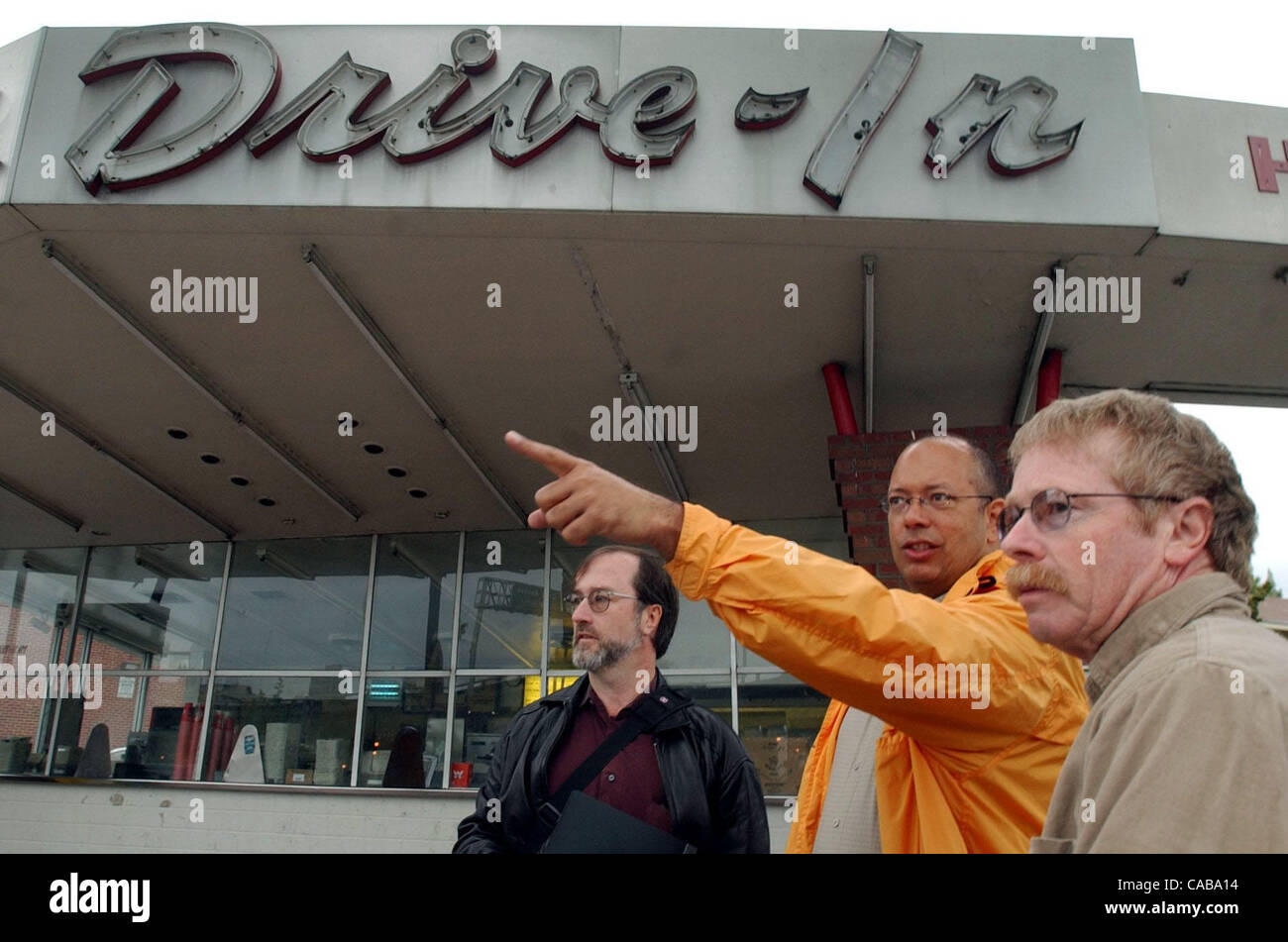 City Planning Commission chair (c) Clinton Killian is flanked by (L ...